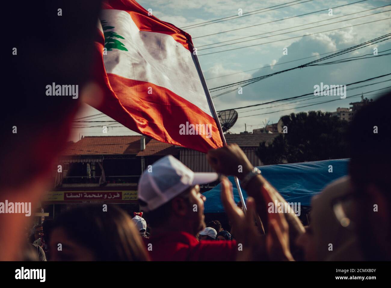 Rising the flag hi-res stock photography and images - Alamy