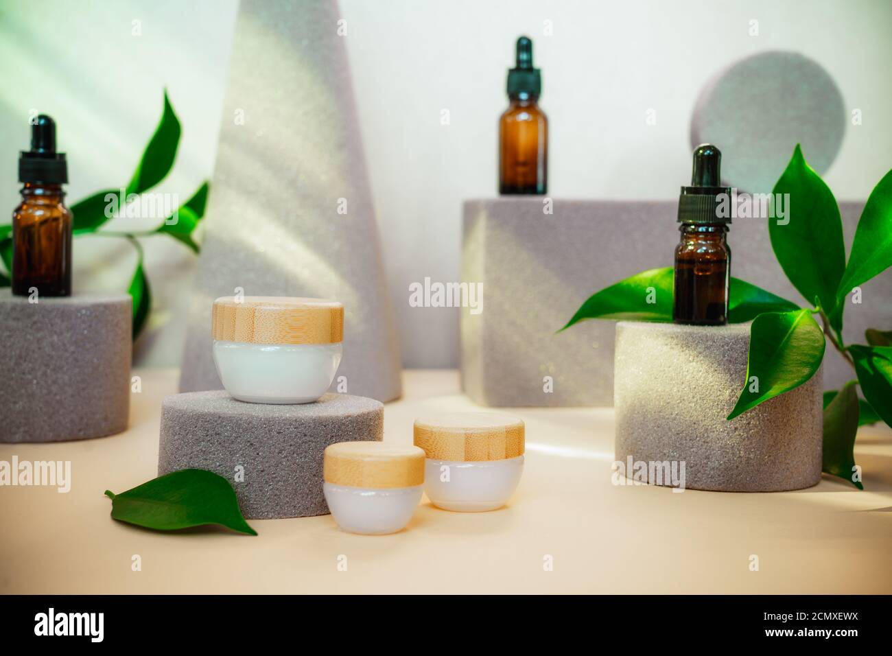 Creative background of geometric shapes with natural cosmetic creams ...