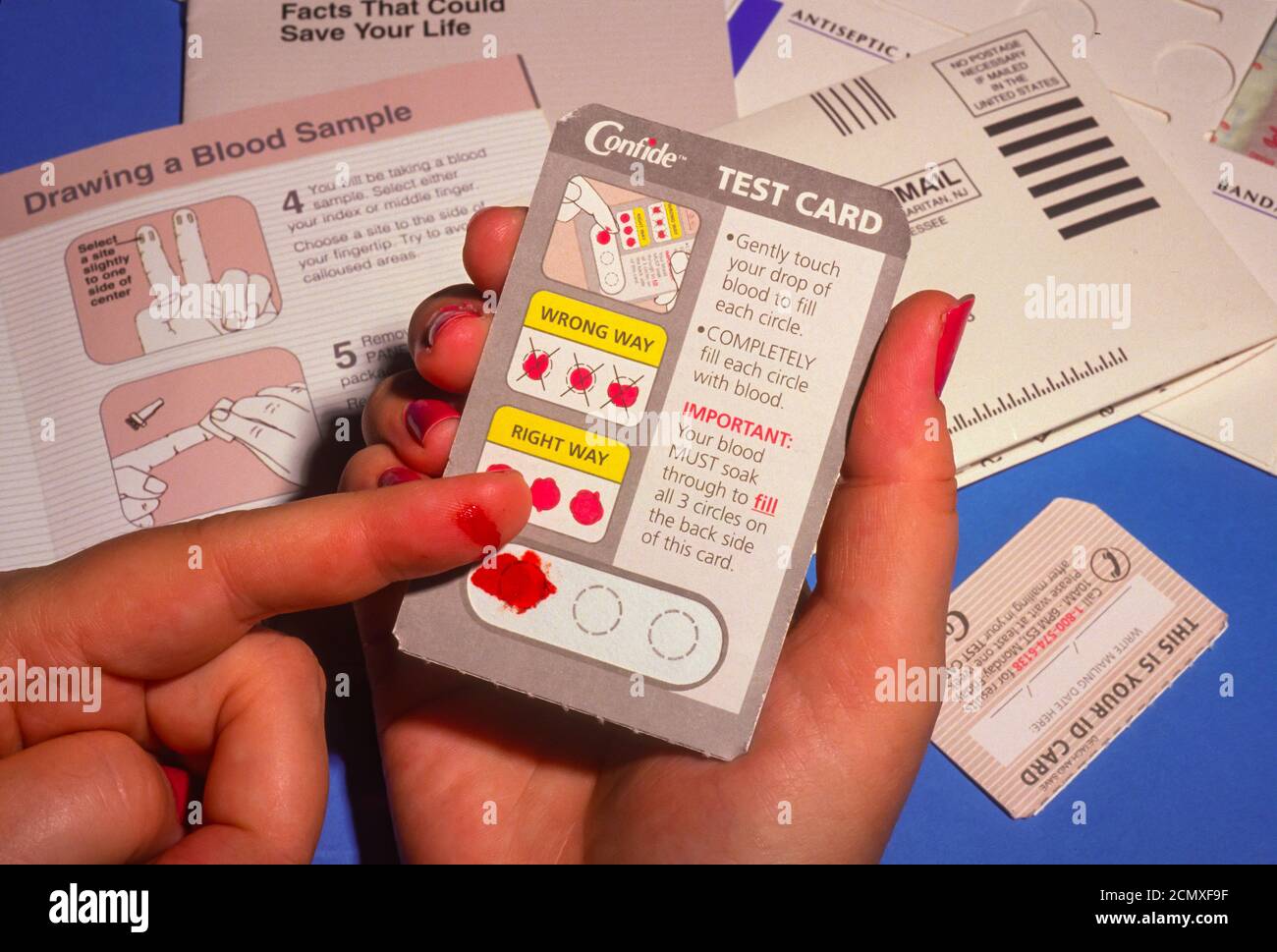 WASHINGTON DC, USA, JUNE 23,1994: Blood sample from finger prick using ...