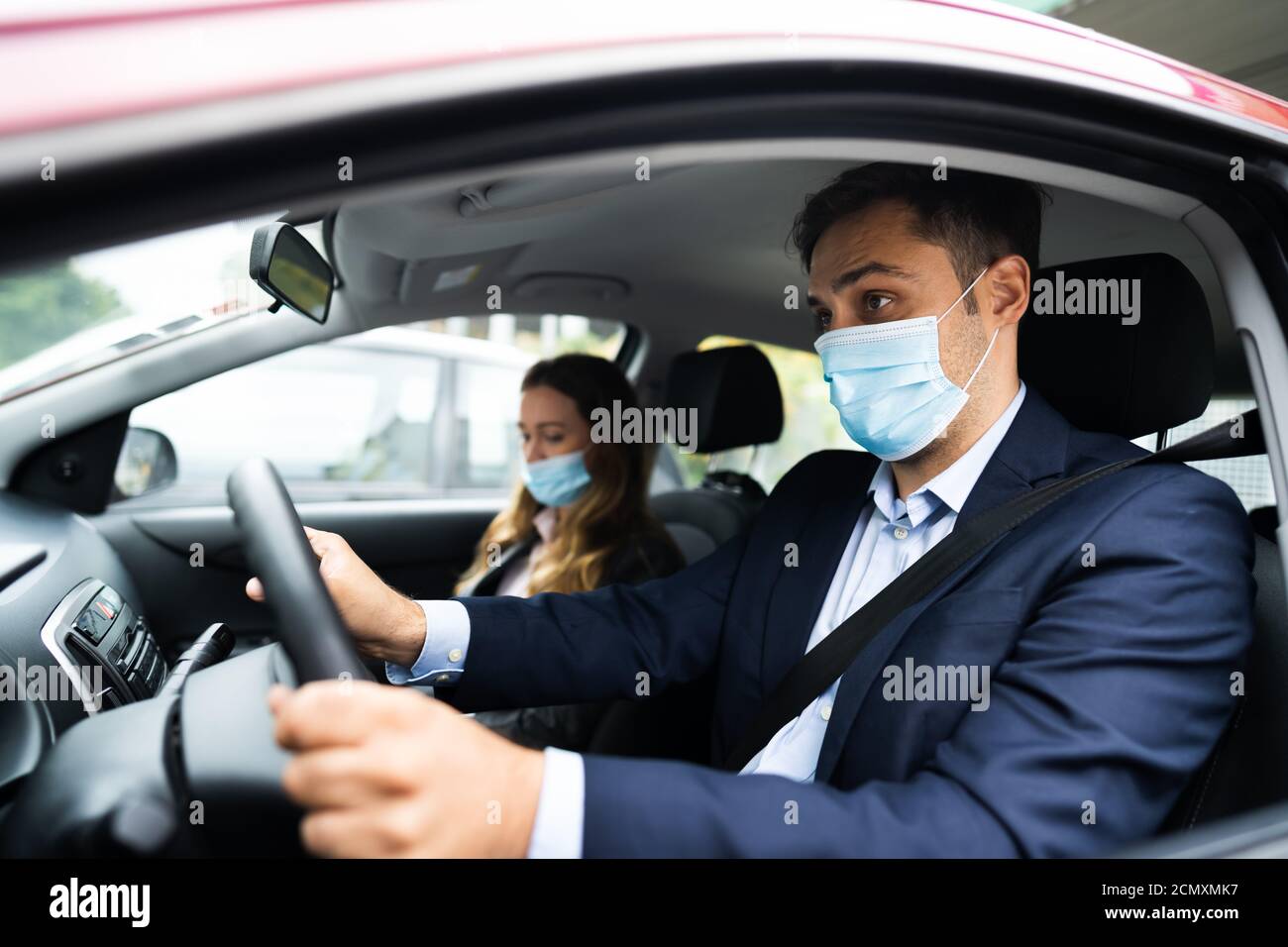 People Carpooling And Car Sharing With Face Masks Stock Photo - Alamy