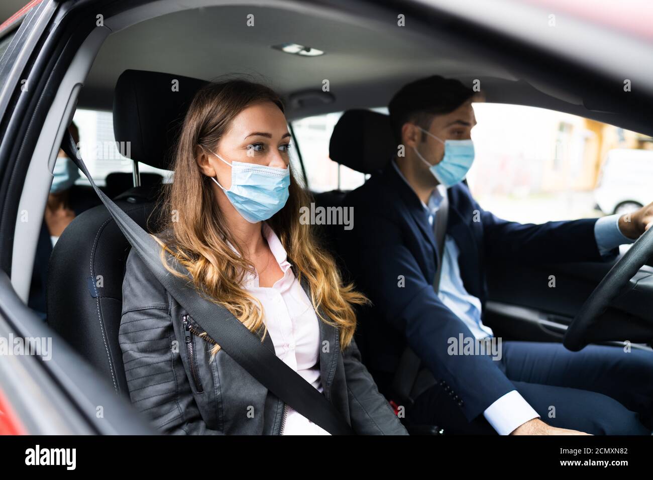 People Carpooling And Car Sharing With Face Masks Stock Photo - Alamy