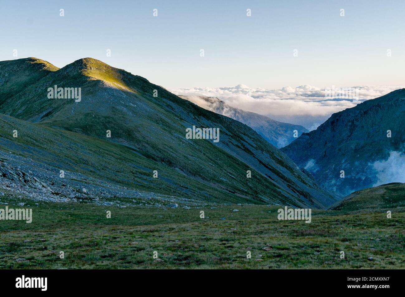 Beautiful scenery of mountains and the clouds during daylight Stock ...
