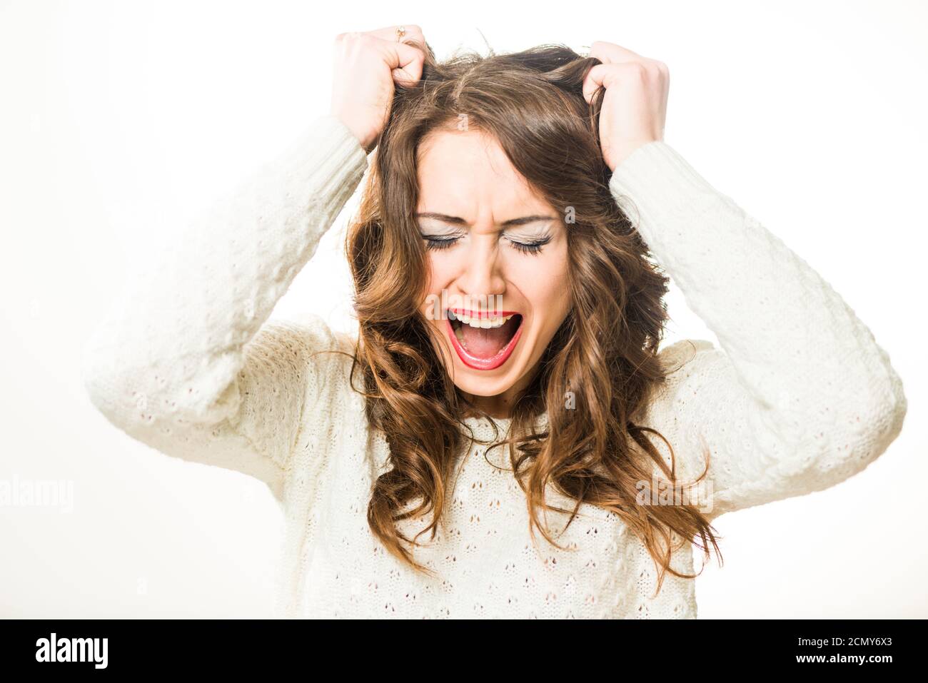 Young woman with expressive emotion closeup portrait on white ...