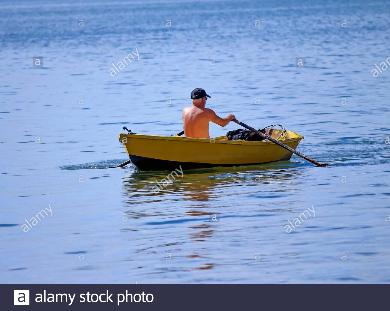 Old Man Rowing Boat High Resolution Stock Photography and Images - Alamy