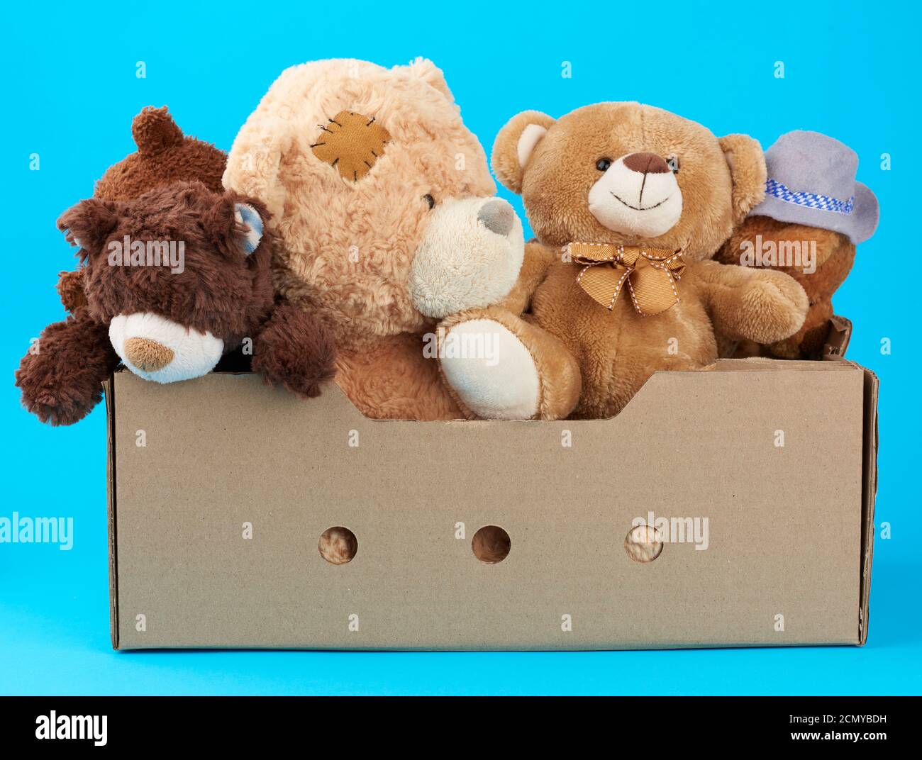 brown cardboard box with various teddy bears Stock Photo - Alamy