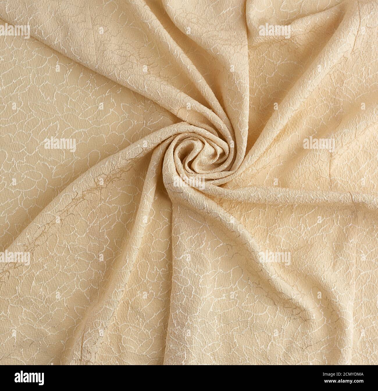 beige satin textile fabric with embroidery elements, piece of canvas ...