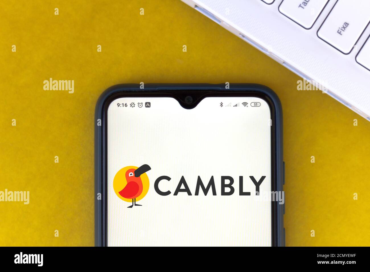 In this photo illustration the Cambly logo seen displayed on a ...