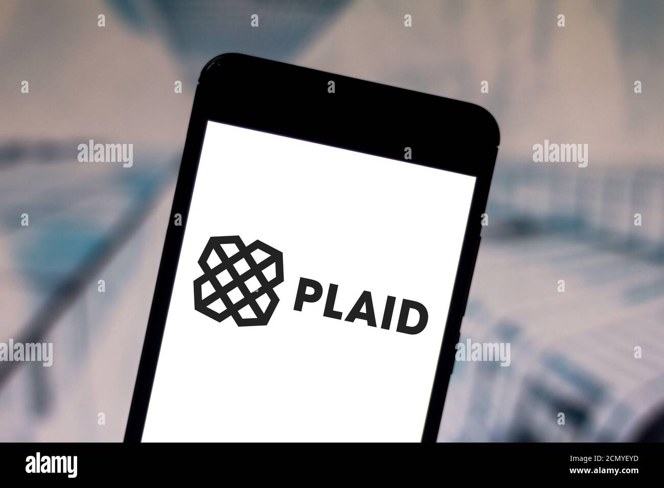 In this photo illustration of the Plaid logo seen displayed on a ...
