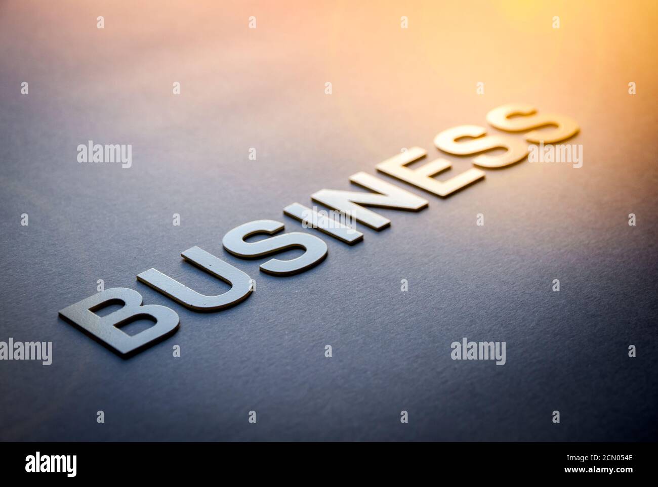 Word business written with white solid letters Stock Photo - Alamy