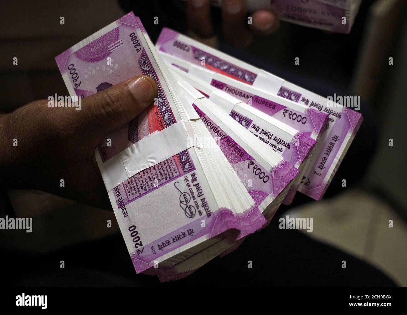 Indian bank cashier hi-res stock photography and images - Alamy