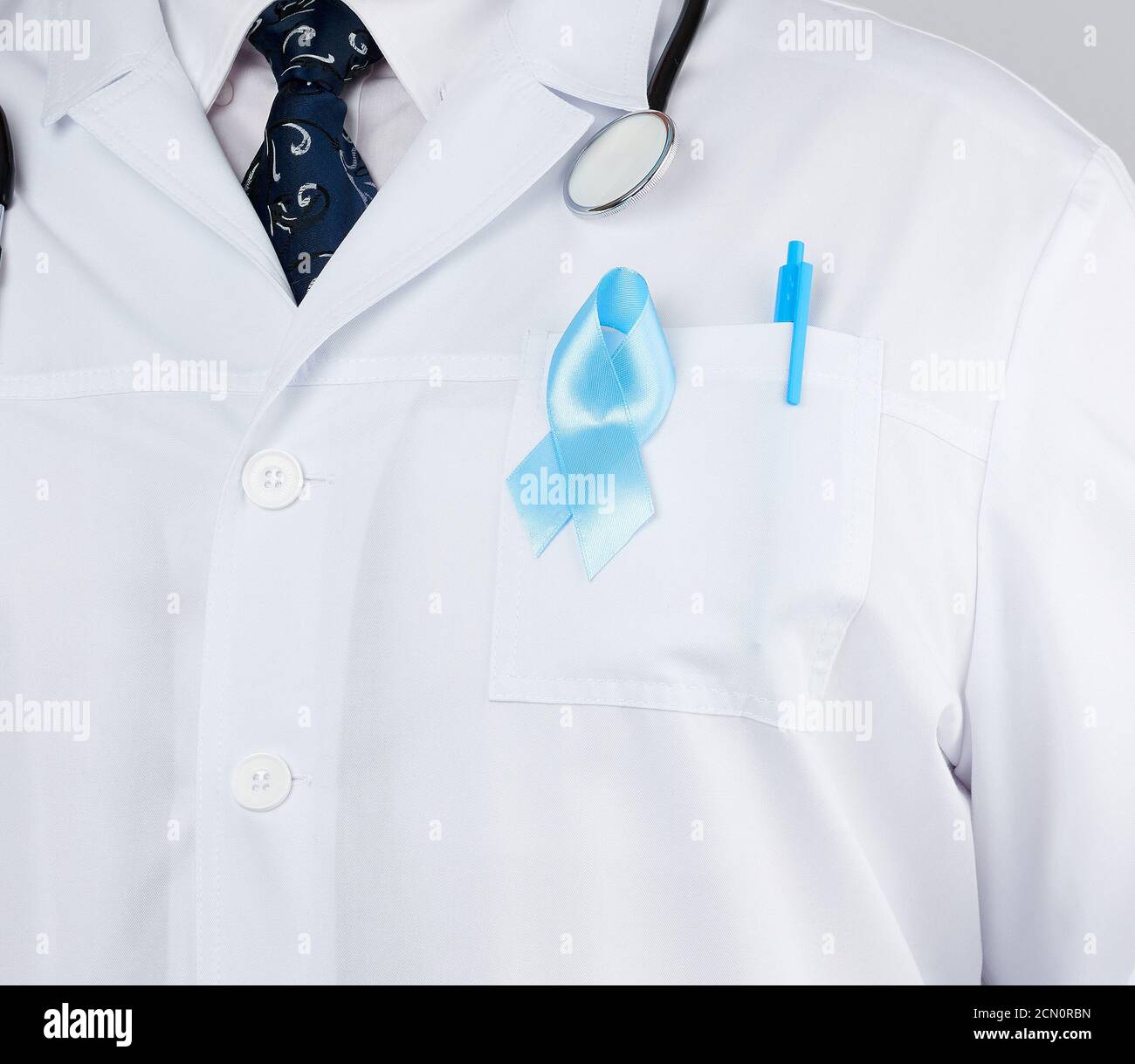 on the pocket pinned a blue ribbon in the shape of a loop Stock Photo ...