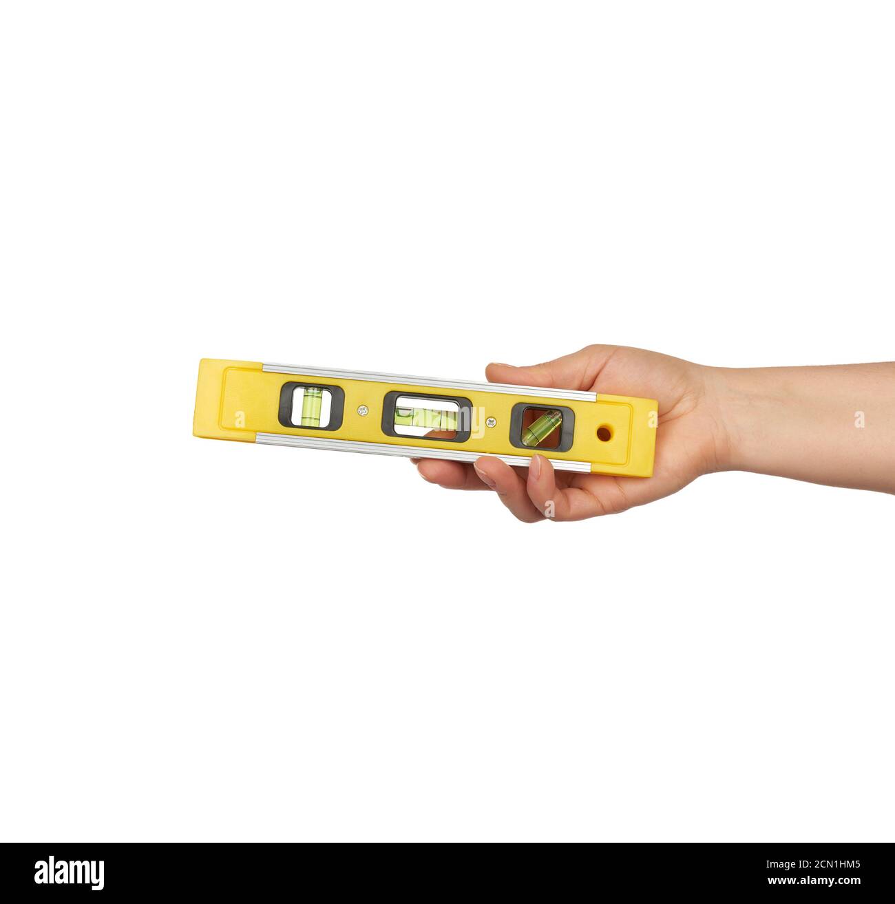 plastic yellow level tool with capsules isolated on white background ...