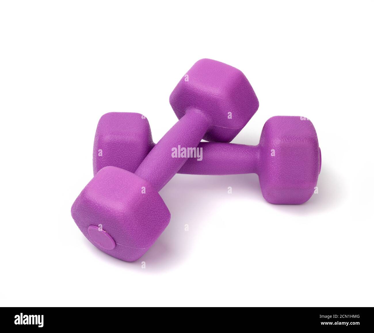 purple plastic dumbbell for sports isolated on white background Stock ...