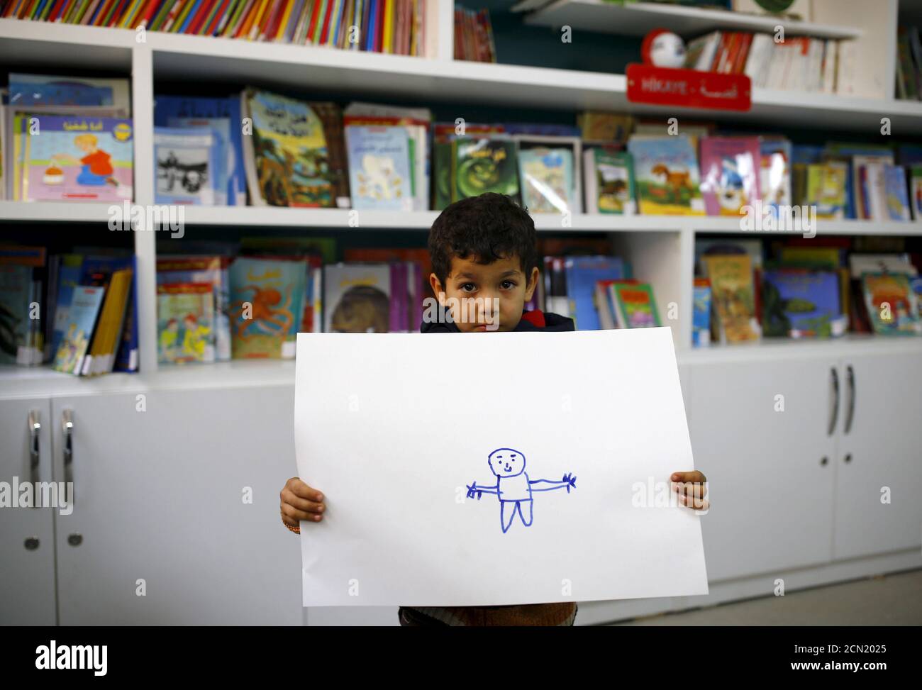 A boy shows his drawings hi-res stock photography and images - Alamy