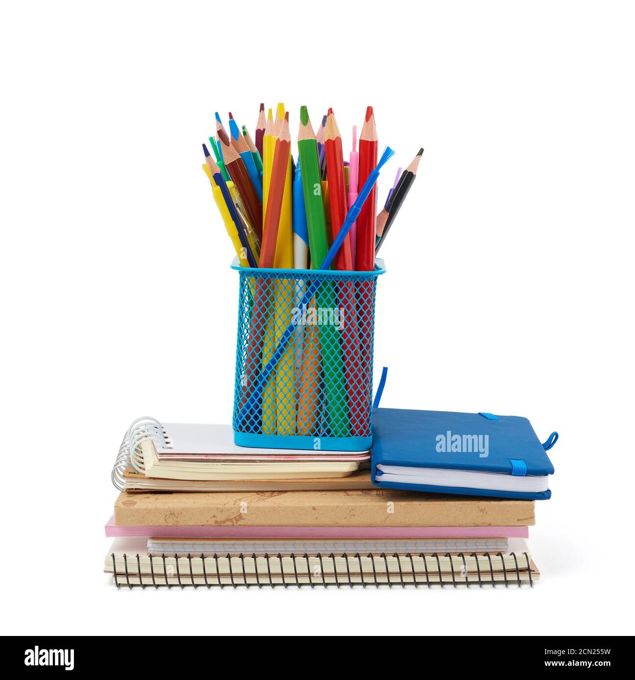 wooden multi-colored pencils, plastic pens and a stack of paper ...