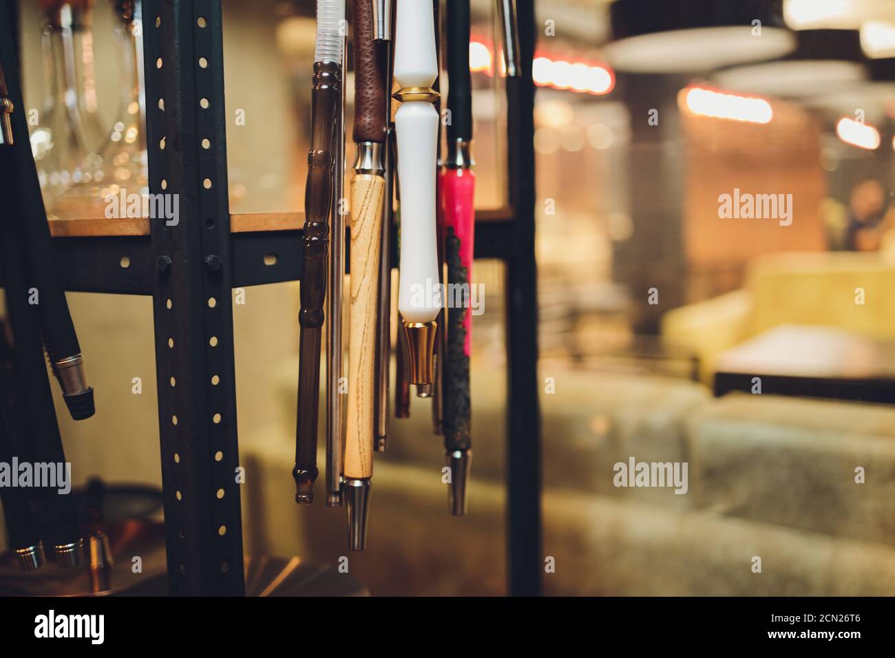Egyptian hose with mouthpiece for hookah hanging on the rack Stock ...