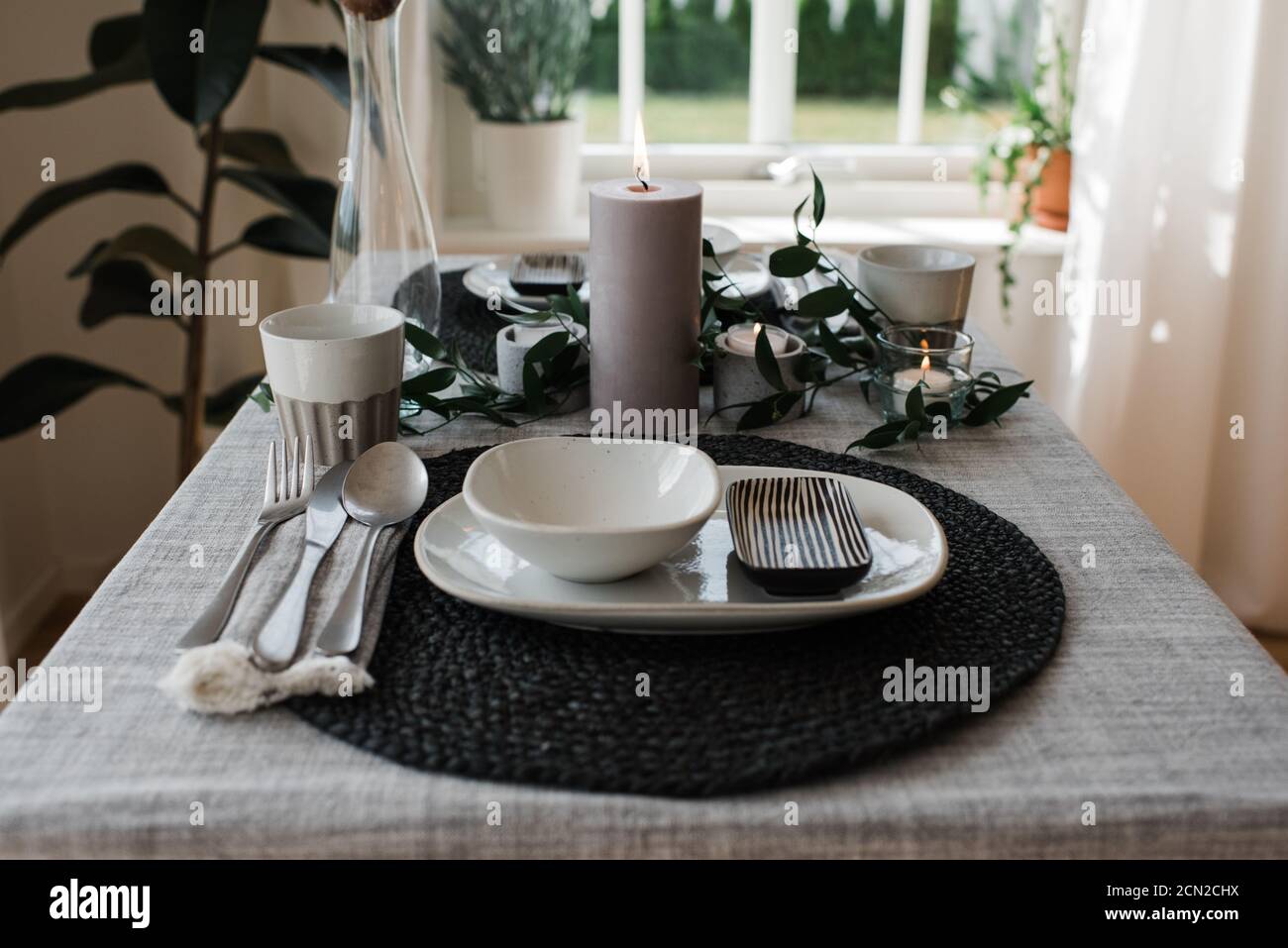 dinner table set up for a romantic meal for two Stock Photo - Alamy