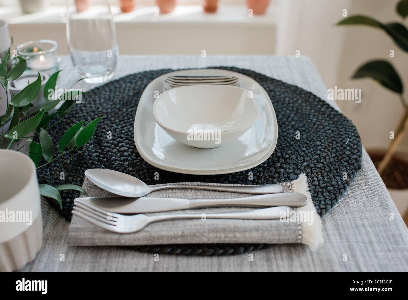 place setting on a romantic dinner table for two Stock Photo - Alamy