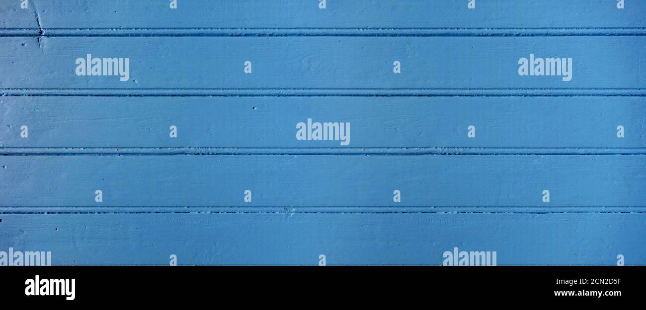 Old wood board painted blue. Banner background Stock Photo - Alamy