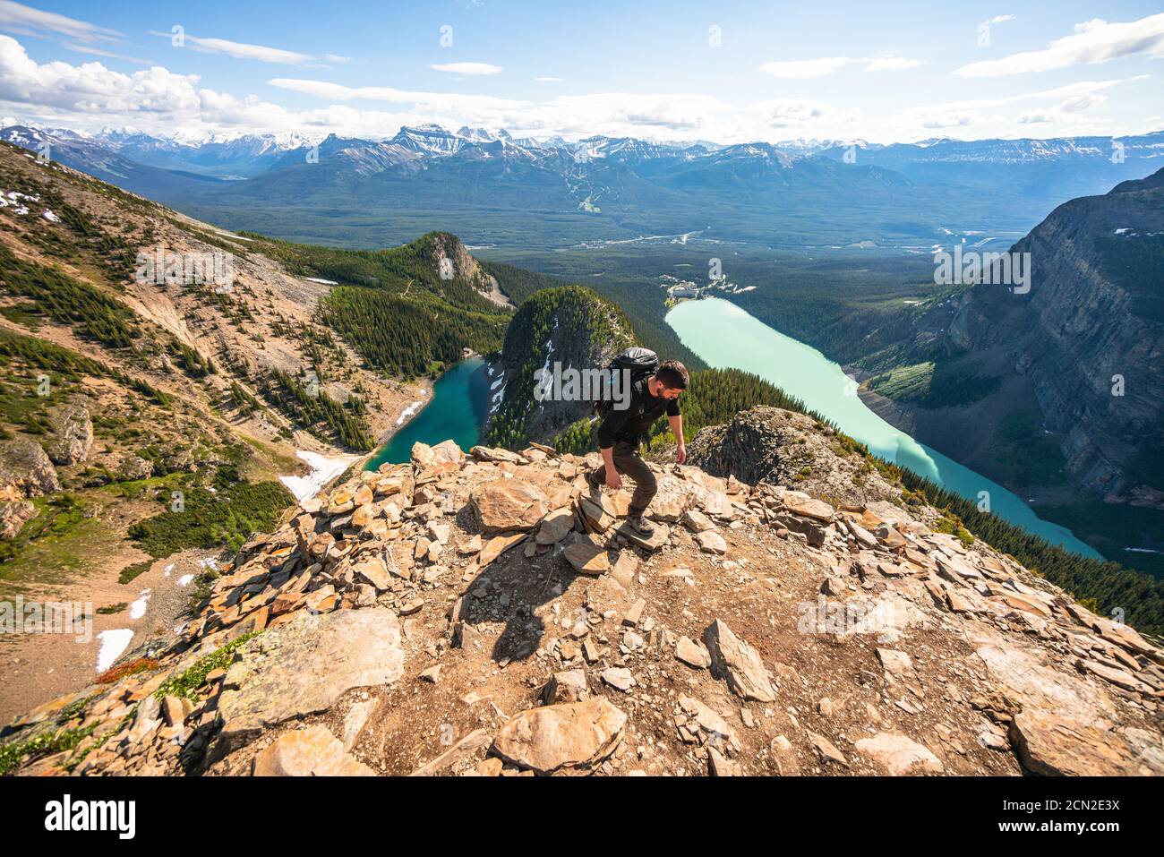 Hiker Climbing Up Devil's Thumb Peak in Lake Louise Banff Stock Photo ...