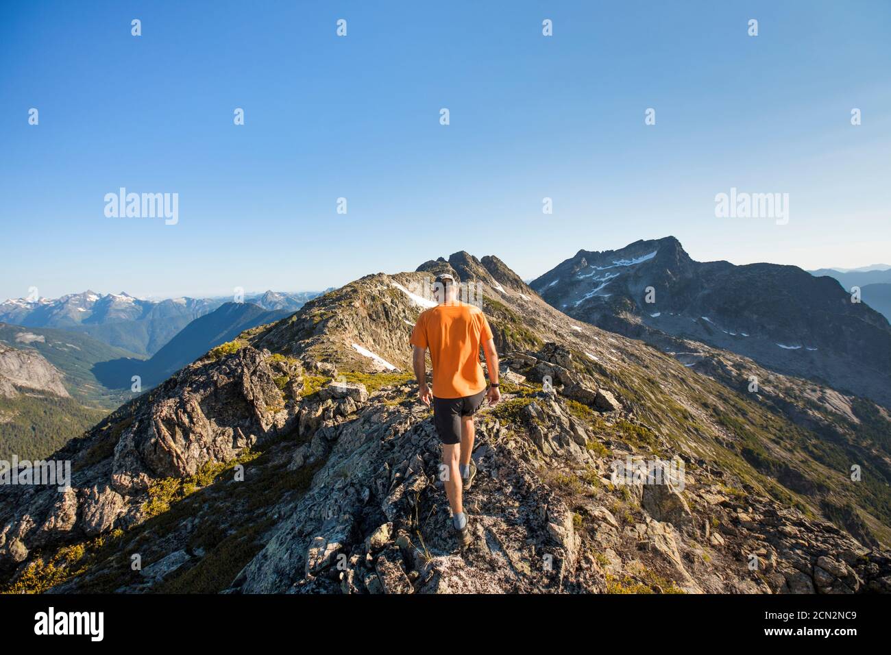 Man running backpack trail hi-res stock photography and images - Alamy