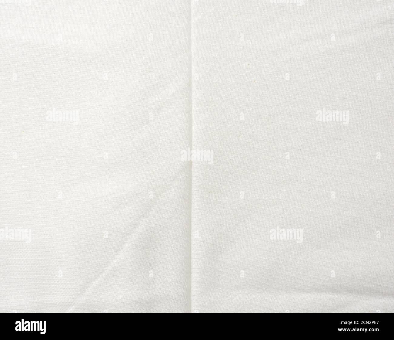 white cotton fabric folded, full frame, textile for sewing clothes and ...