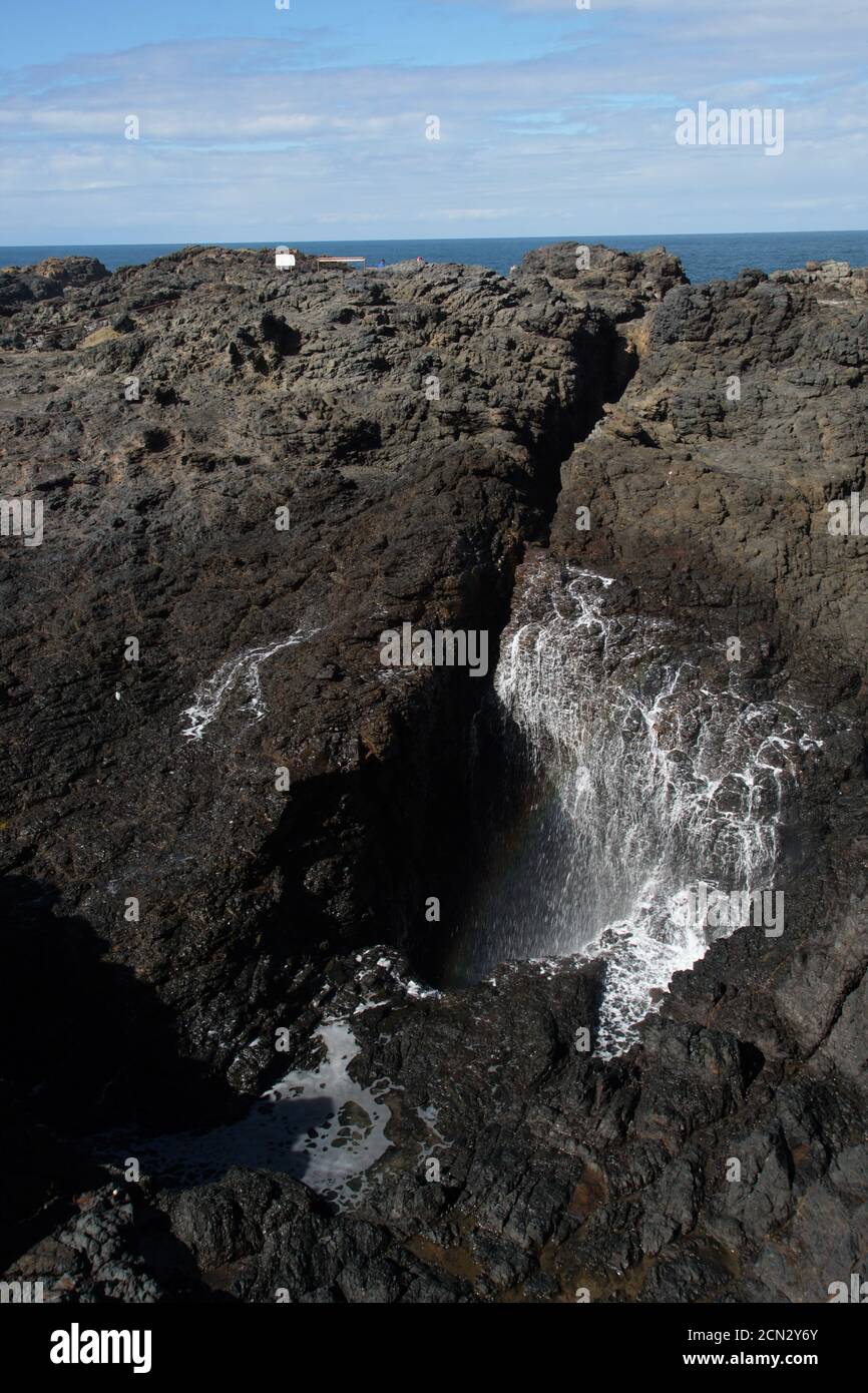 Water receding back into a Blowhole Stock Photo - Alamy