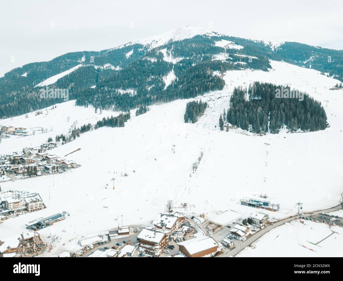 Beautiful mountain town covered in snow in the Alps in Austria Stock ...