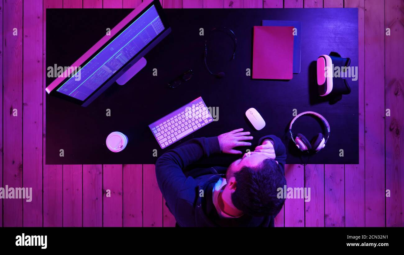 Bearded programmer hacker waiting for program to process. Tired Stock ...