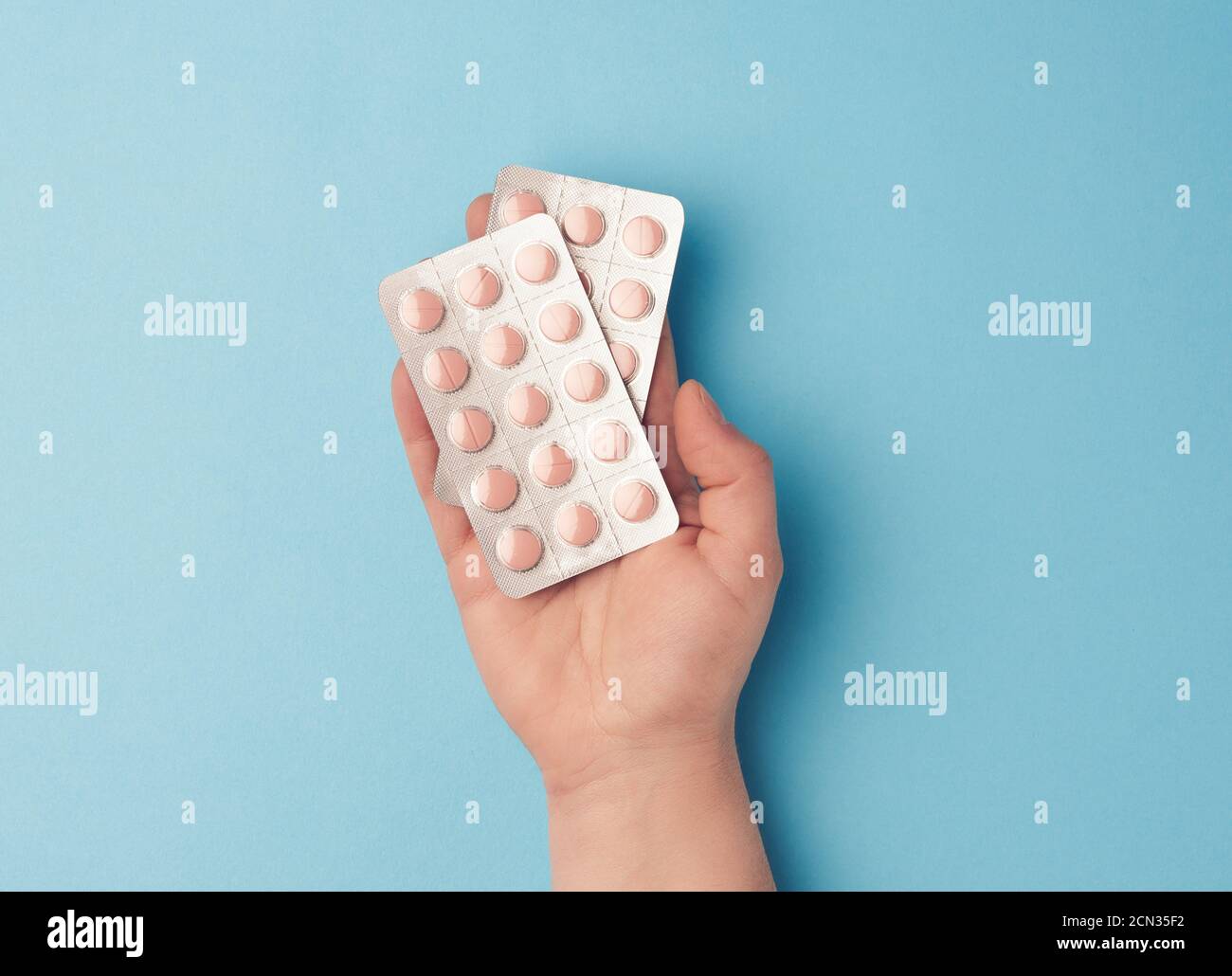 Hold tablets hi-res stock photography and images - Alamy