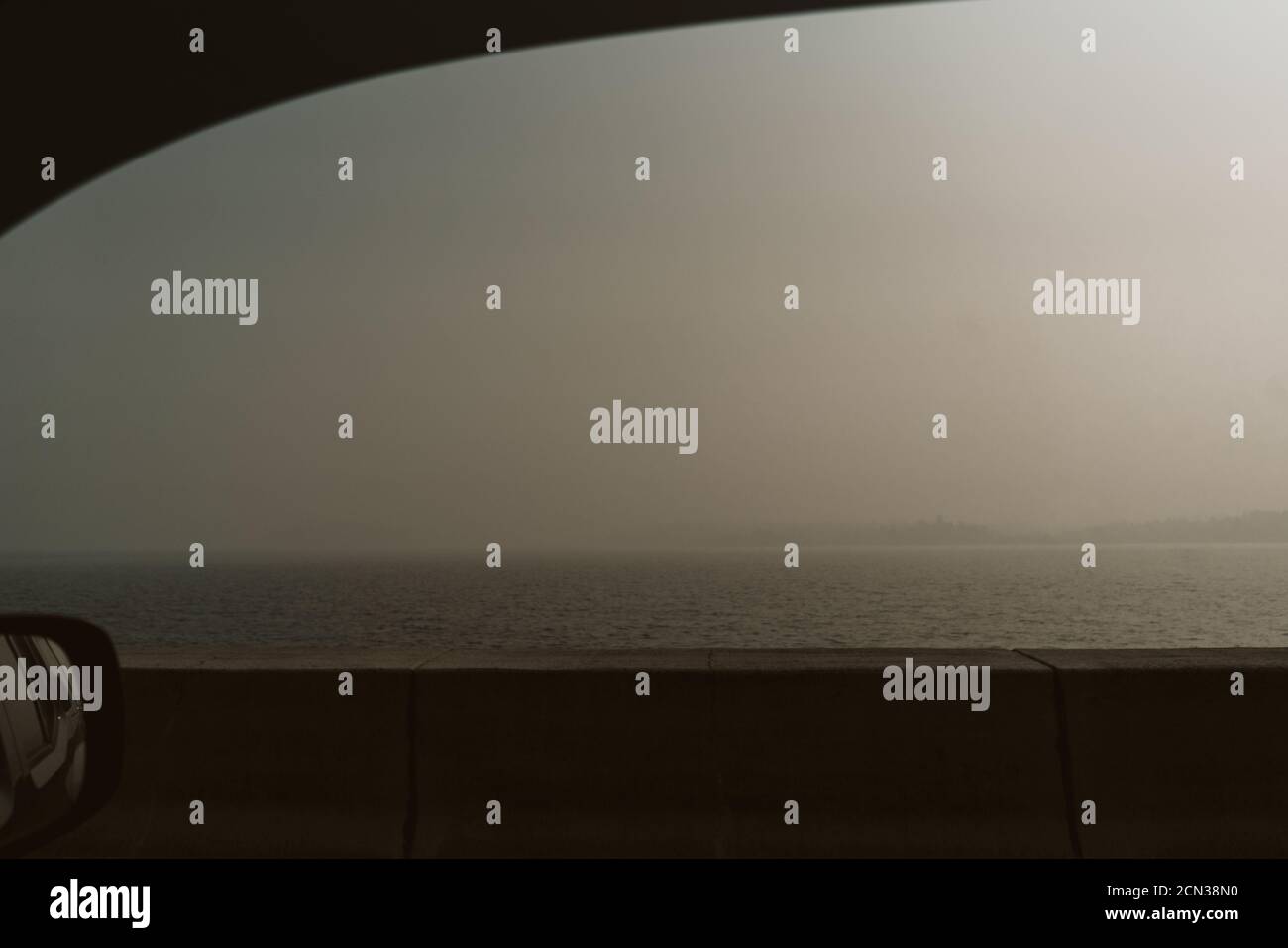 View from a car window of a wildfire smoke-covered Lake Washington ...