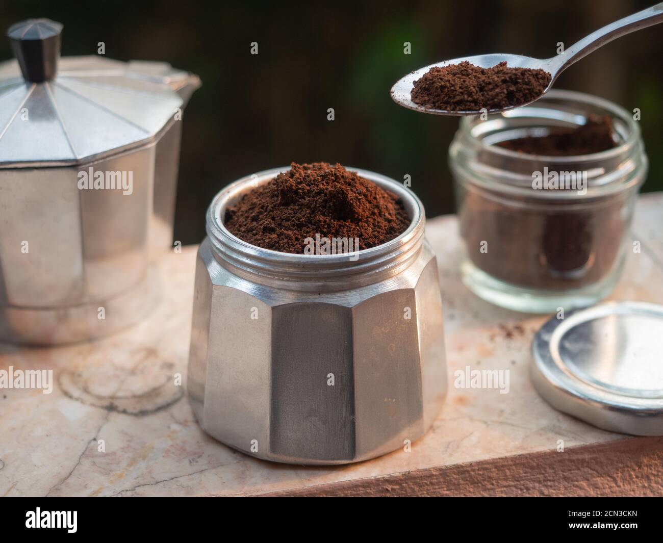 Putting ground coffee moka pot hi-res stock photography and images - Alamy