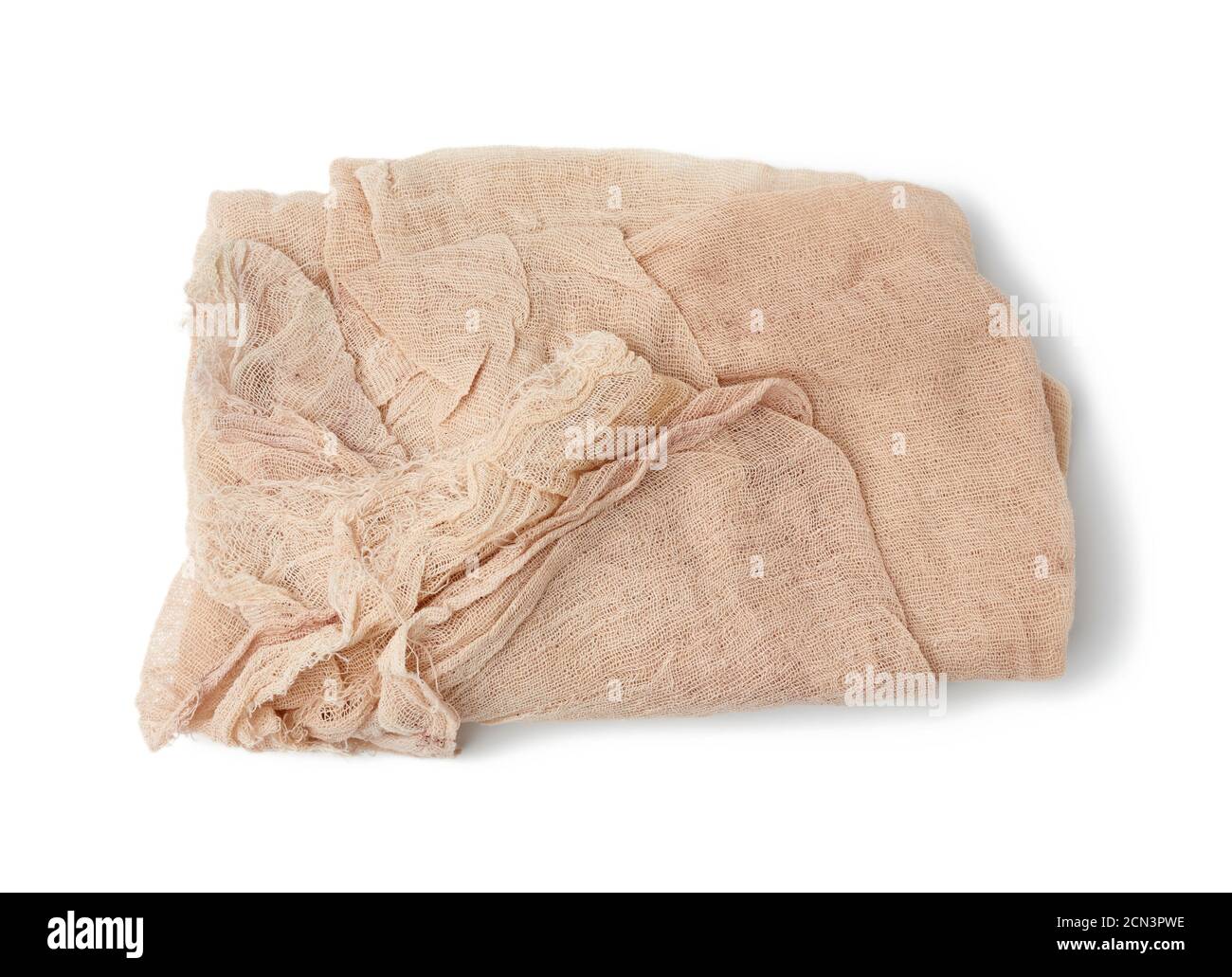 folded cotton beige gauze fabric isolated on white background Stock ...