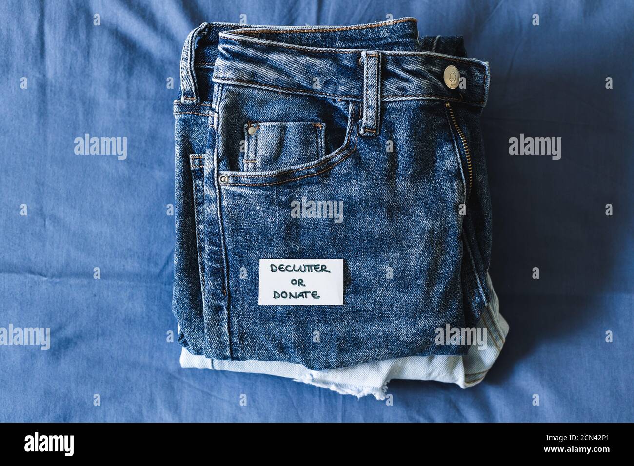tidying up and organizing your wardrobe, Declutter and donate label on ...