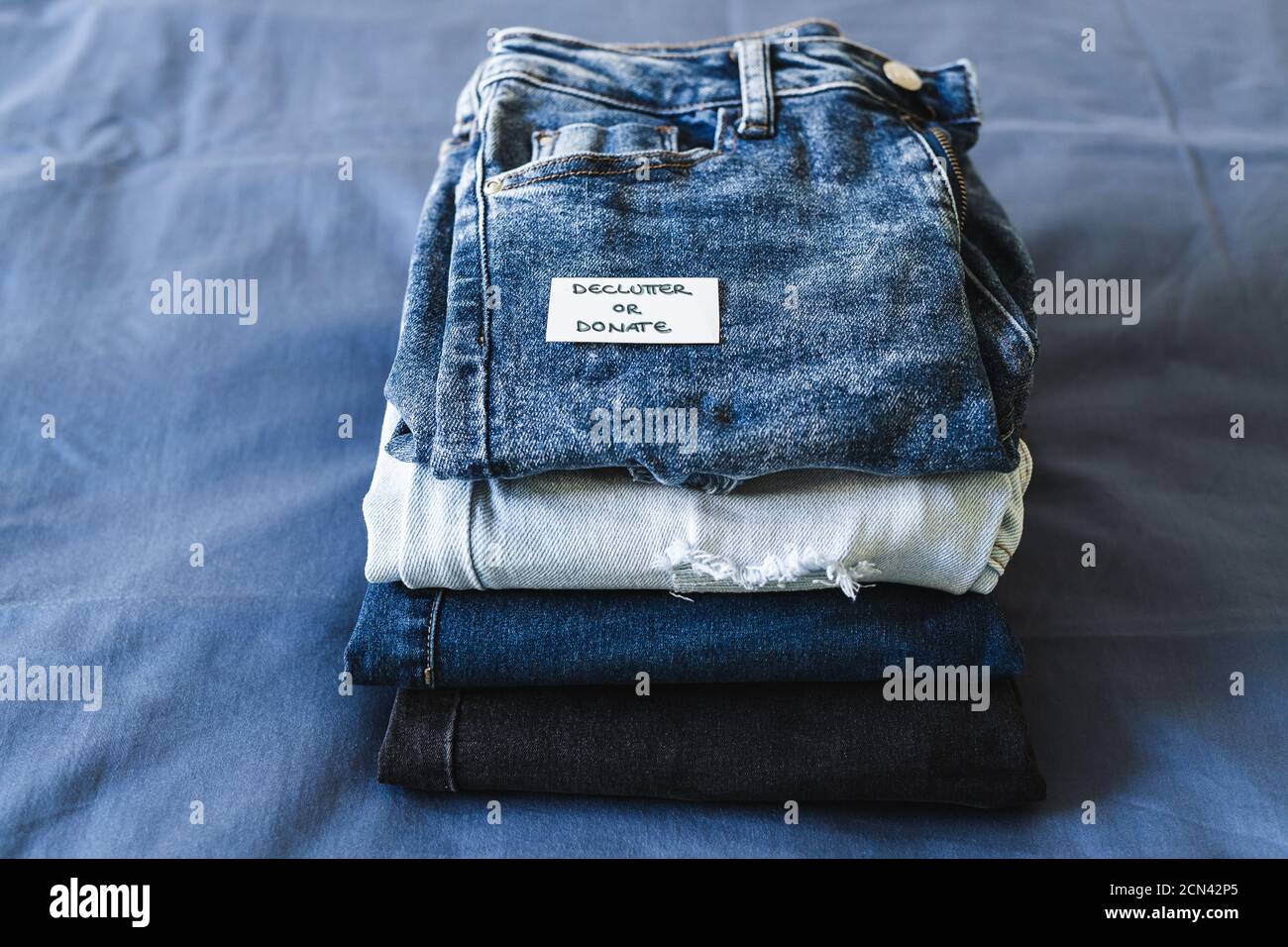 tidying up and organizing your wardrobe, Declutter and donate label on ...