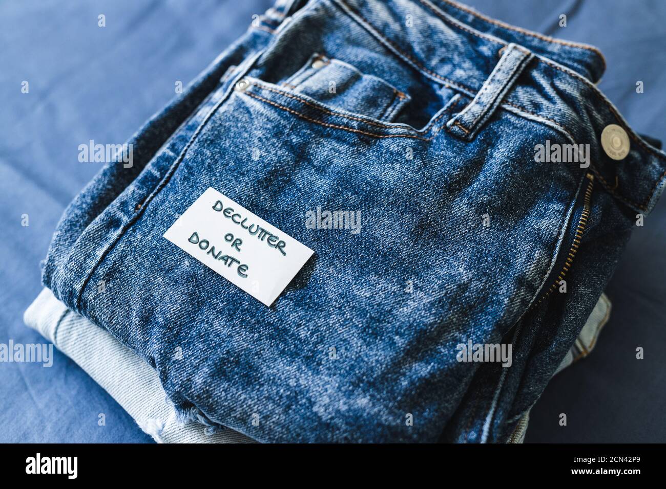 tidying up and organizing your wardrobe, Declutter and donate label on ...