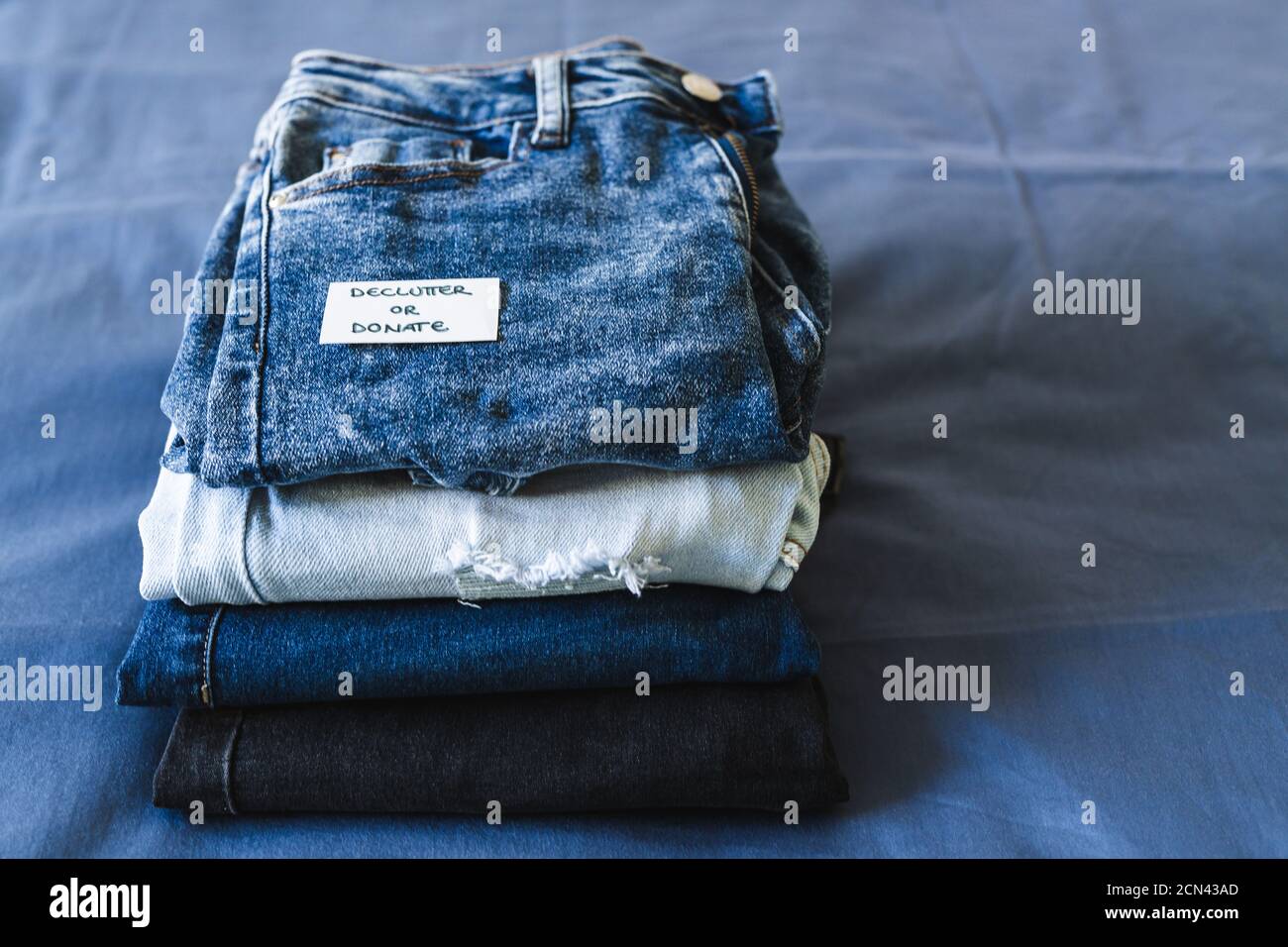 tidying up and organizing your wardrobe, Declutter and donate label on ...