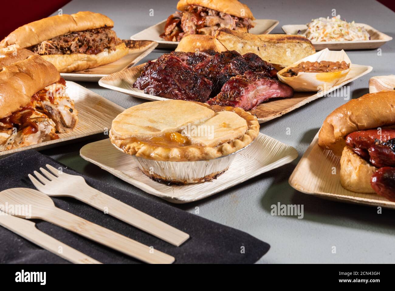 BBQ meal buffet served family style spread on a table showing a variety ...