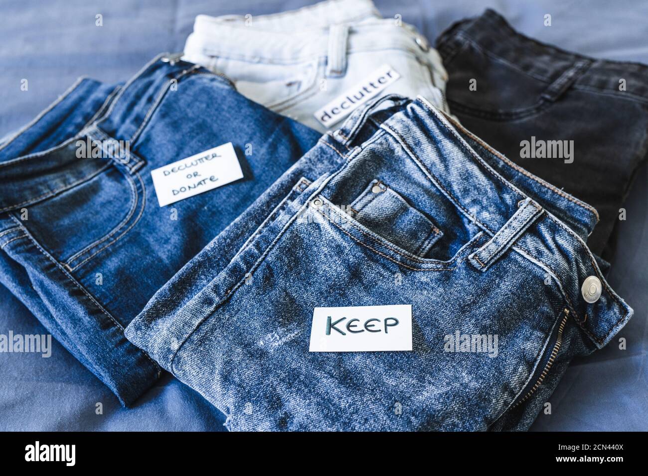 tidying up and organizing your wardrobe, Keep vs Declutter label on ...
