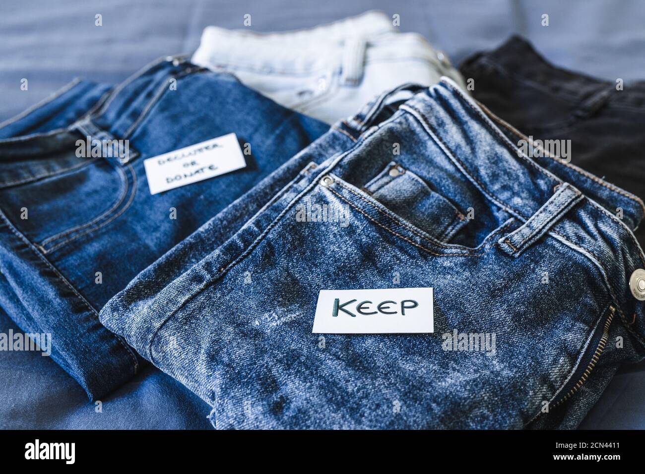 tidying up and organizing your wardrobe, Keep vs Declutter label on ...