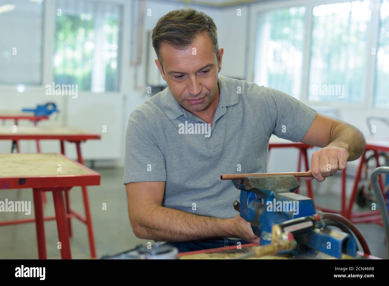 Man sanding a table hi-res stock photography and images - Alamy