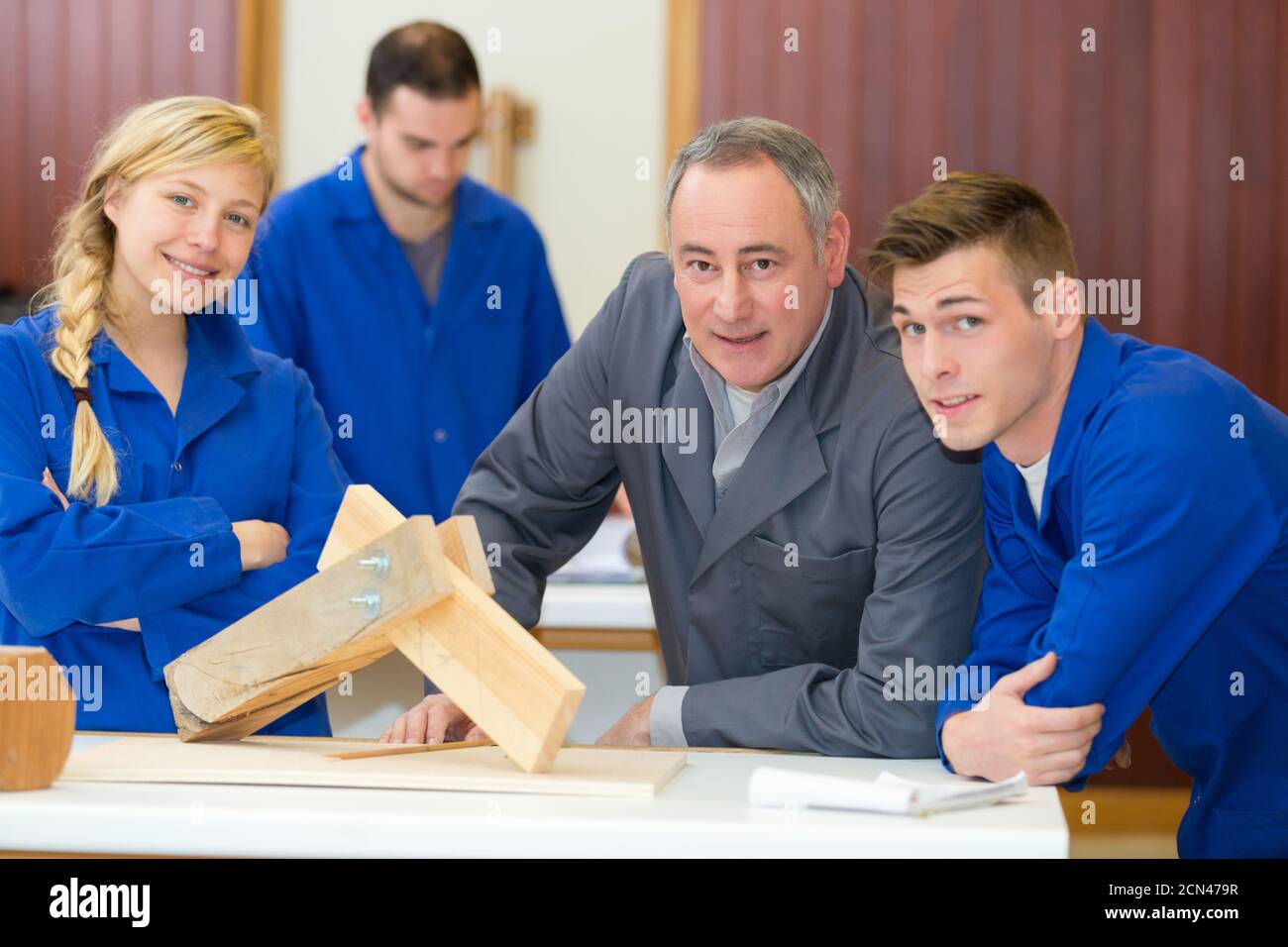 portrait of trainee looking in studio Stock Photo - Alamy