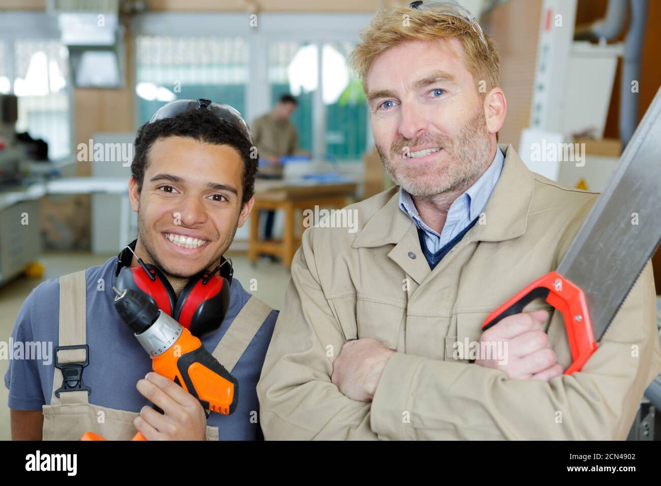 portrait of two men at work Stock Photo - Alamy