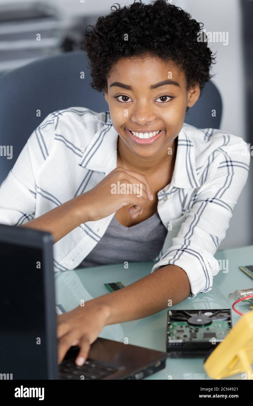 happy and smiling computer female technician isolated on white Stock ...