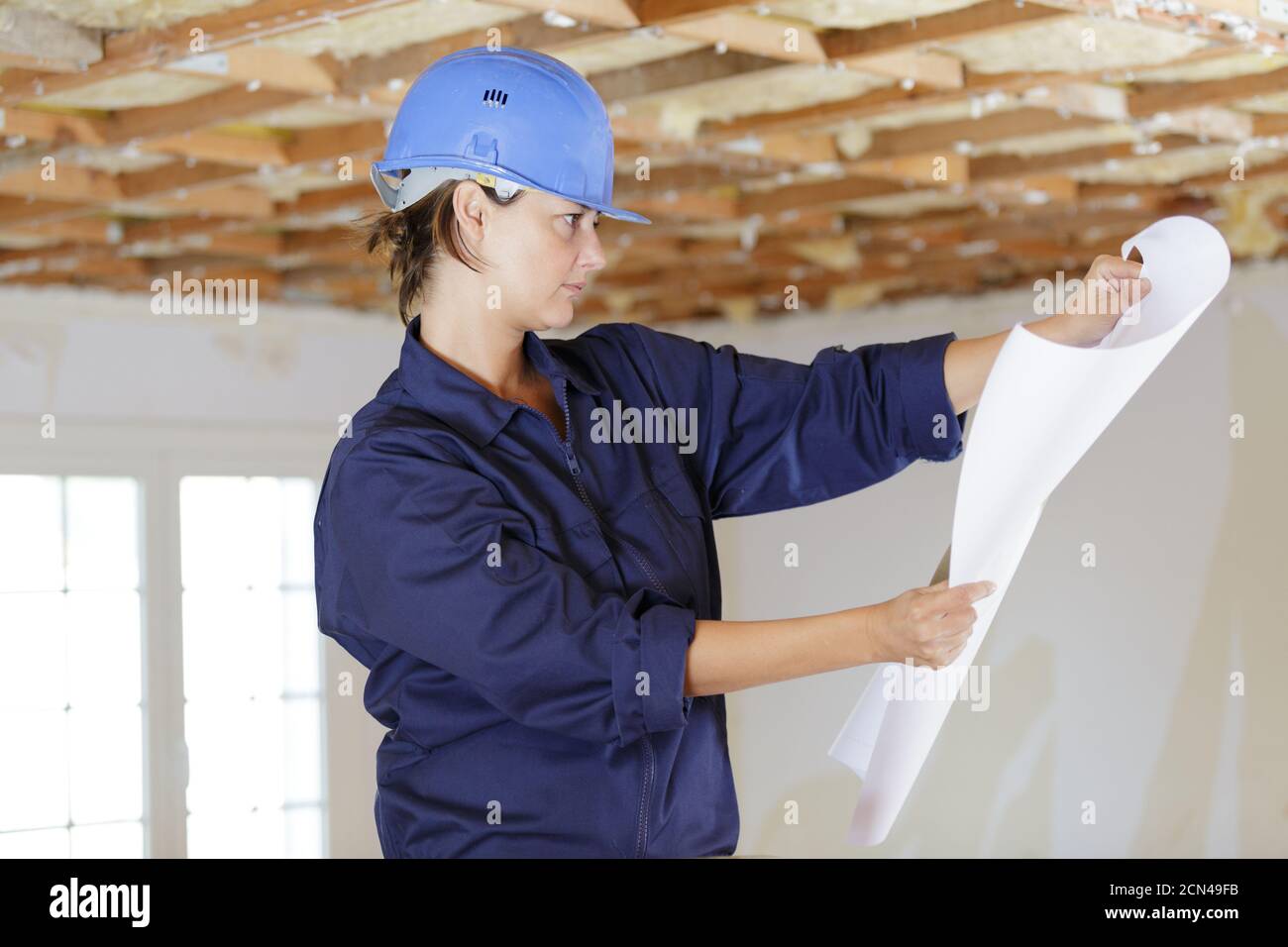 Concentrated young female architect hi-res stock photography and images ...