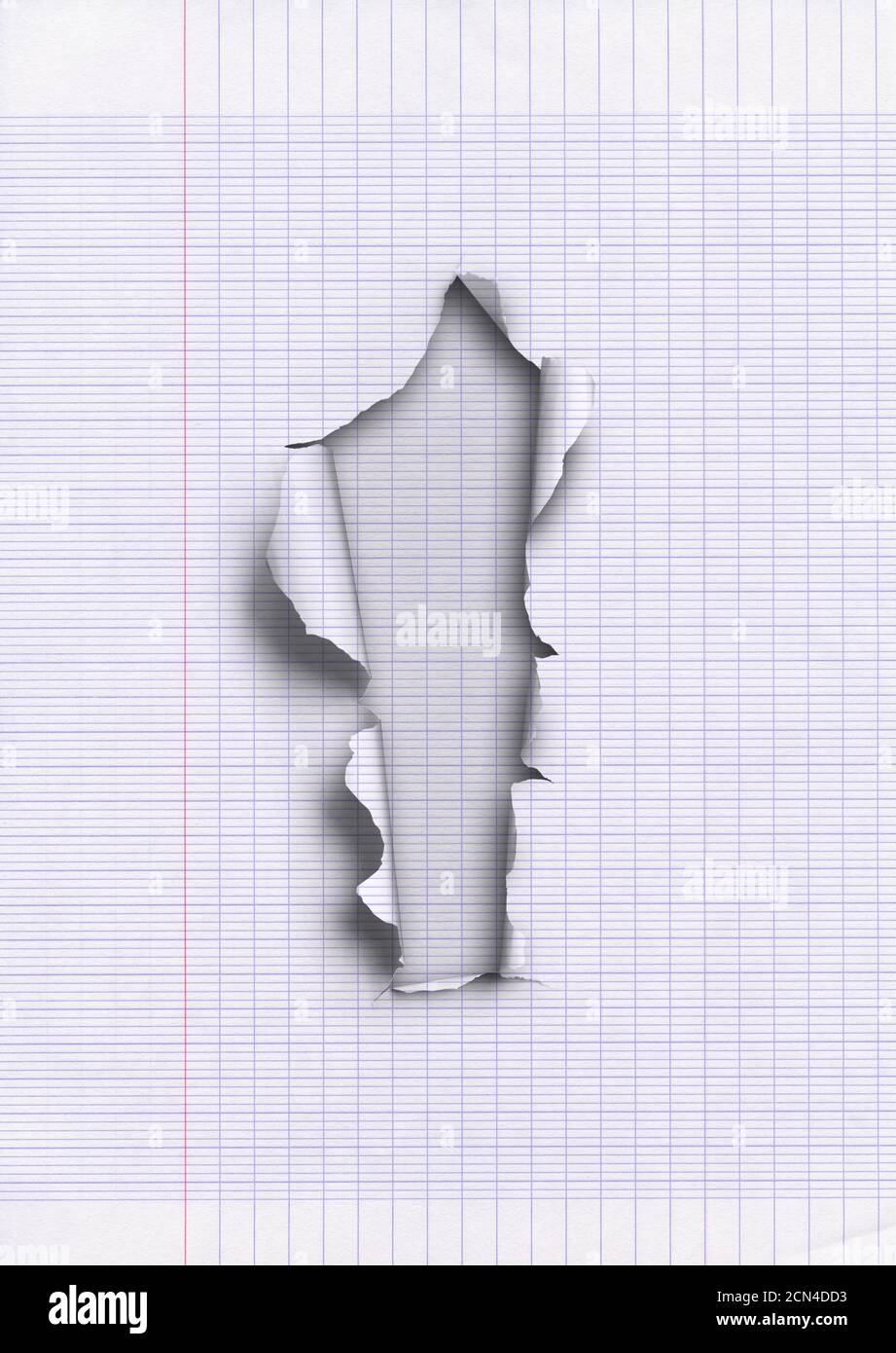 Old lined torn paper with hole Stock Photo - Alamy
