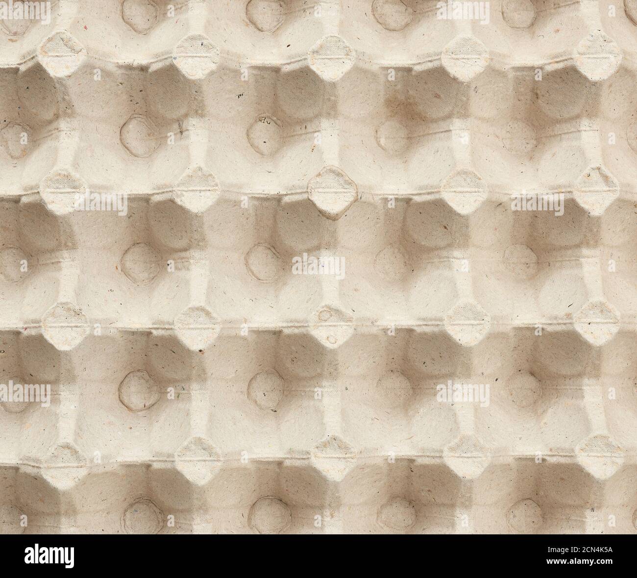 volumetric texture of a beige paper egg tray, full frame Stock Photo ...