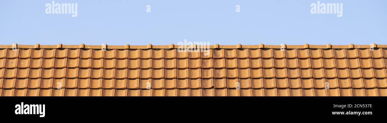 Roof tiles on the top of a house Stock Photo - Alamy