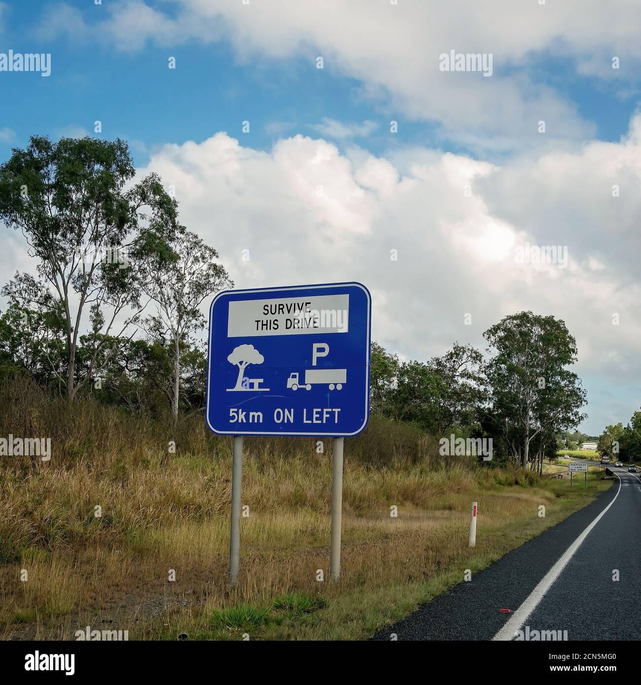 Survive This Drive roadside sign indicating a rest stop ahead Stock ...