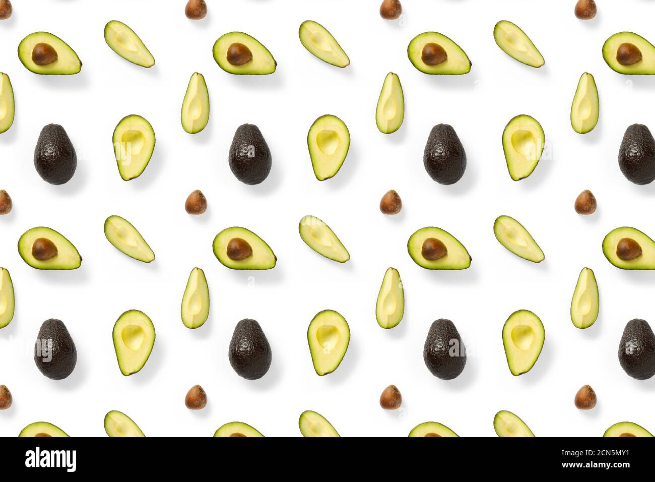 Avocado. Background made from isolated Avocado pieces on white ...